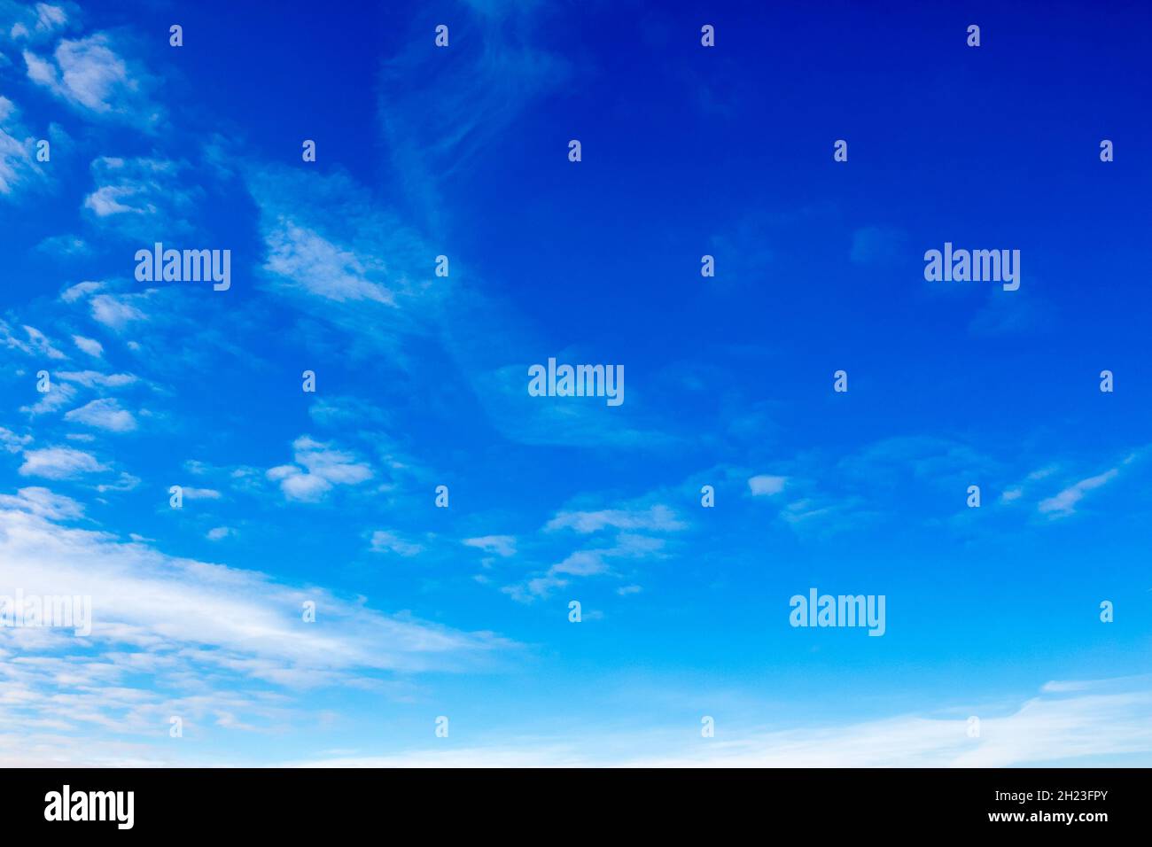 white fluffy clouds on a deep blue sky. sunny weather conditions Stock ...