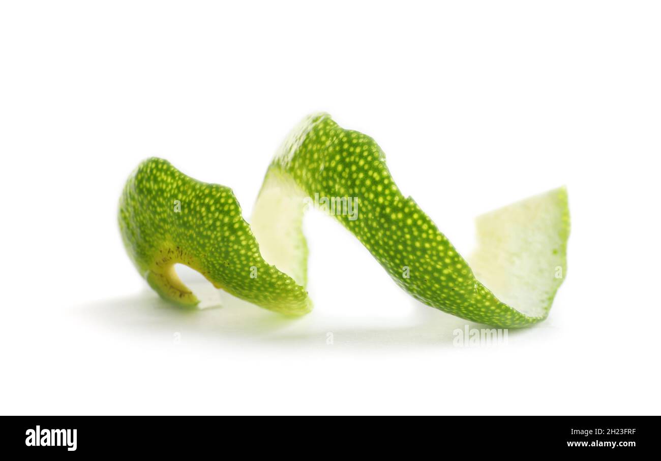 Peel of fresh ripe lime on white background Stock Photo - Alamy