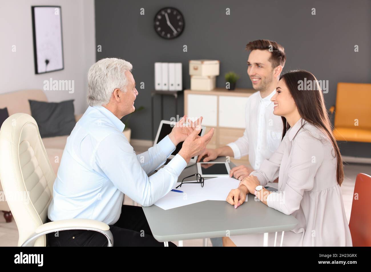 Human resources commission conducting job interview with applicant in office Stock Photo - Alamy