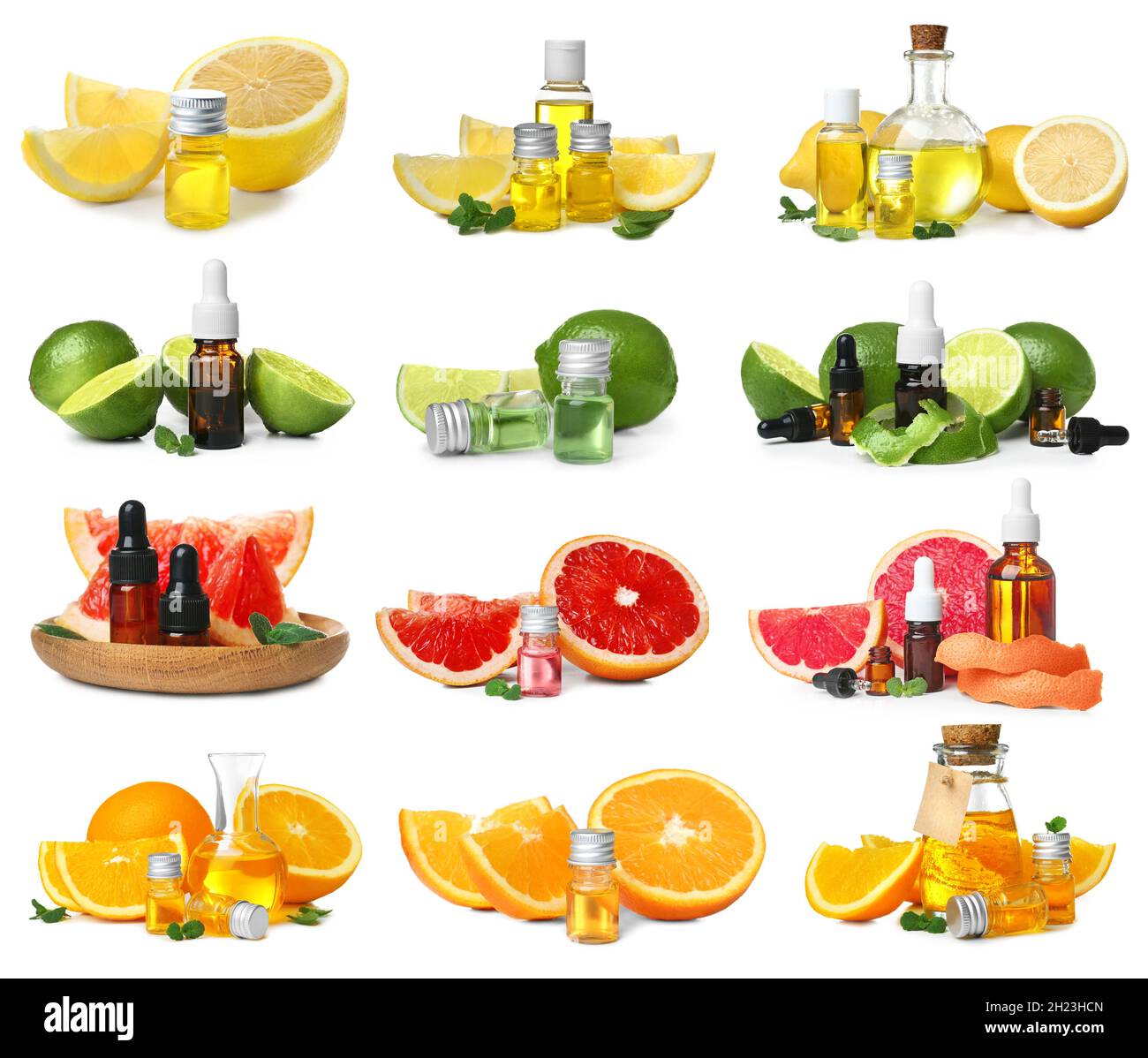 Set with fruit essential oils on white background Stock Photo - Alamy
