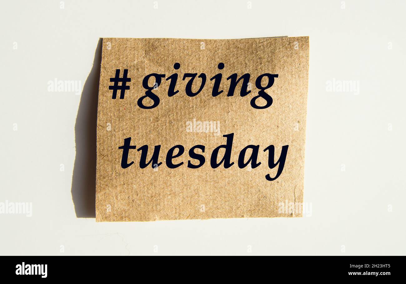 White letterhead and hashtag giving Tuesday, black lettering Stock ...