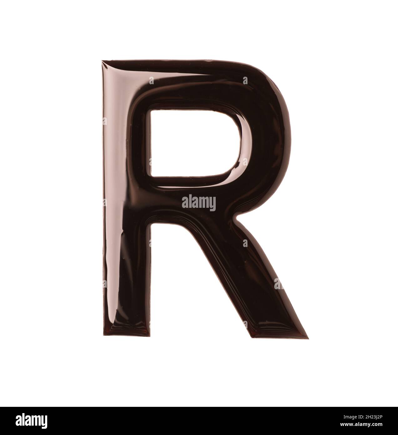 Chocolate letter R on white background, top view Stock Photo - Alamy