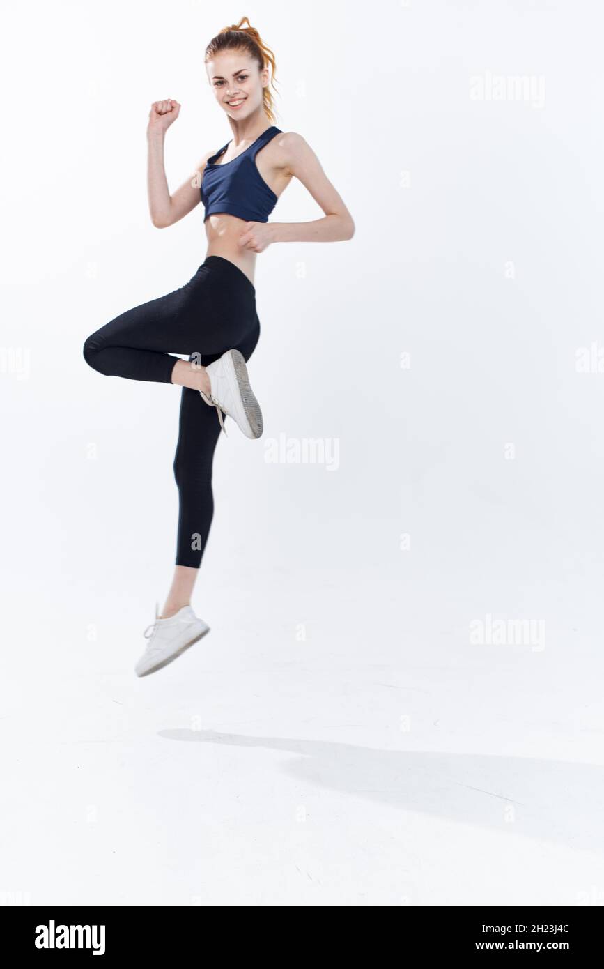 sportive woman jumping workout energy active lifestyle Stock Photo - Alamy