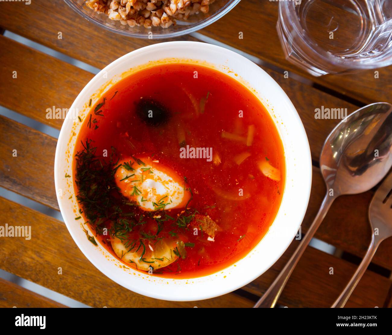 Russian meat soup Solyanka with assorted meat Stock Photo - Alamy