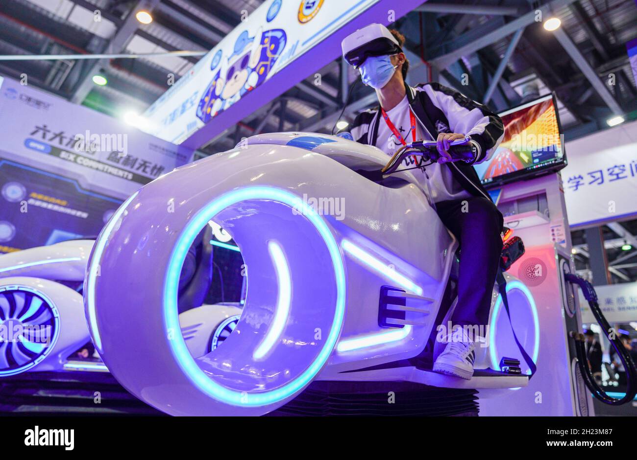 Nanchang city, China, 19 October 2021, People experience VR game ...