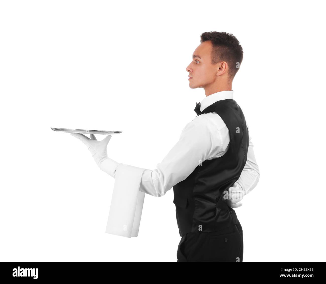 Waiter holding metal tray on white background Stock Photo - Alamy