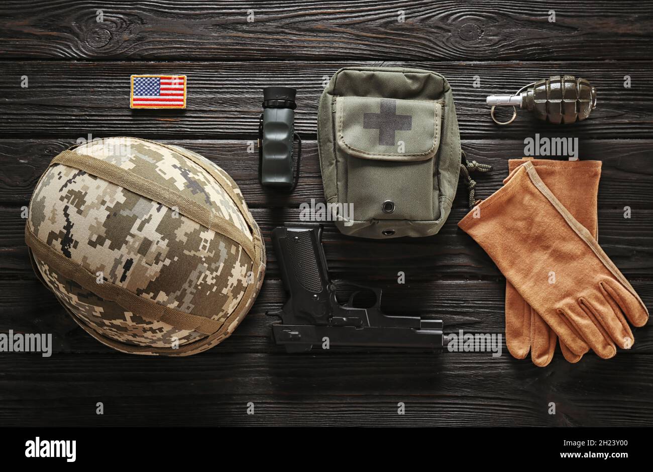 Set of military outfit on dark wooden background, flat lay Stock Photo ...