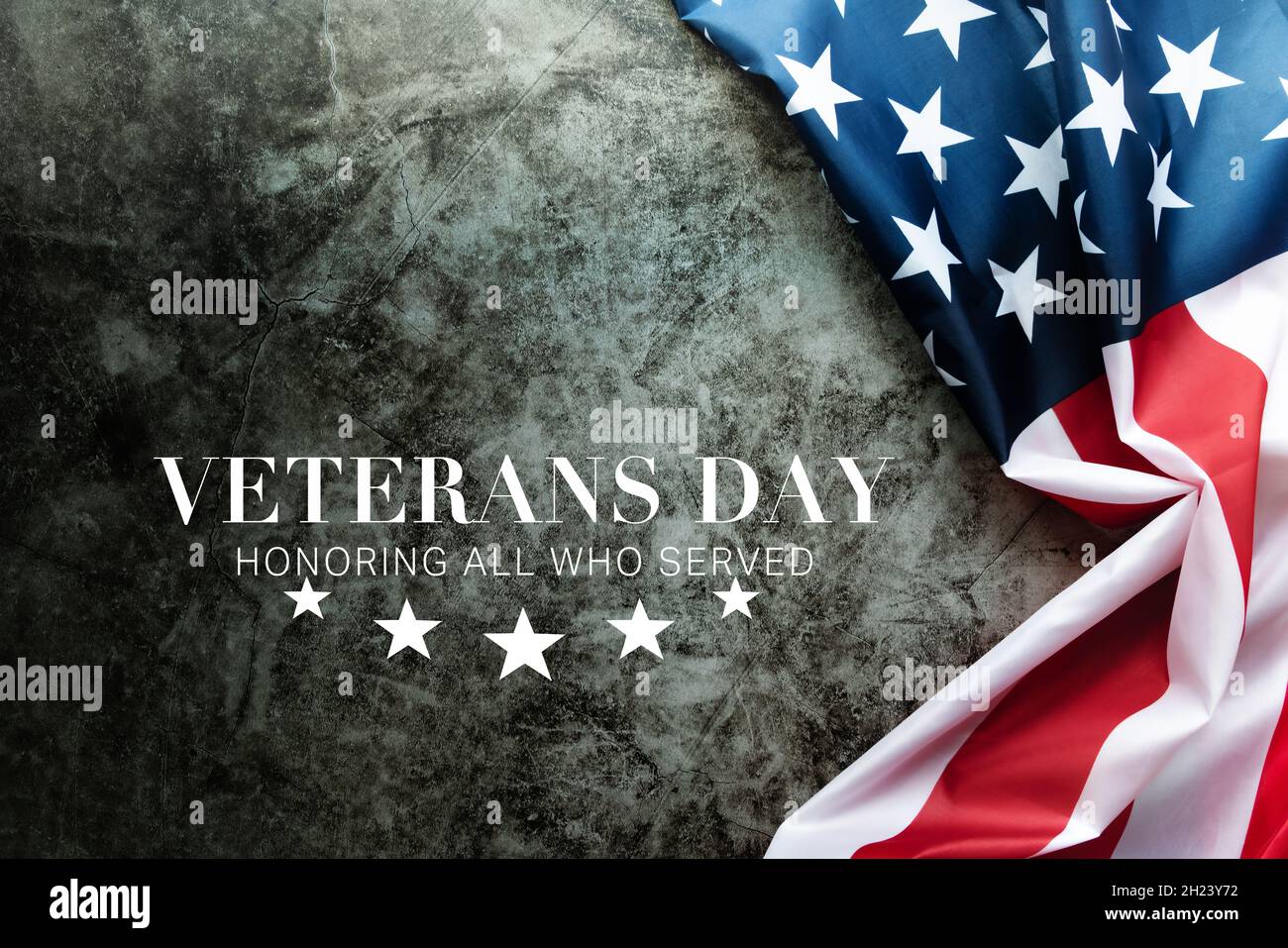 Veterans day. Honoring all who served. American flag on cement ...