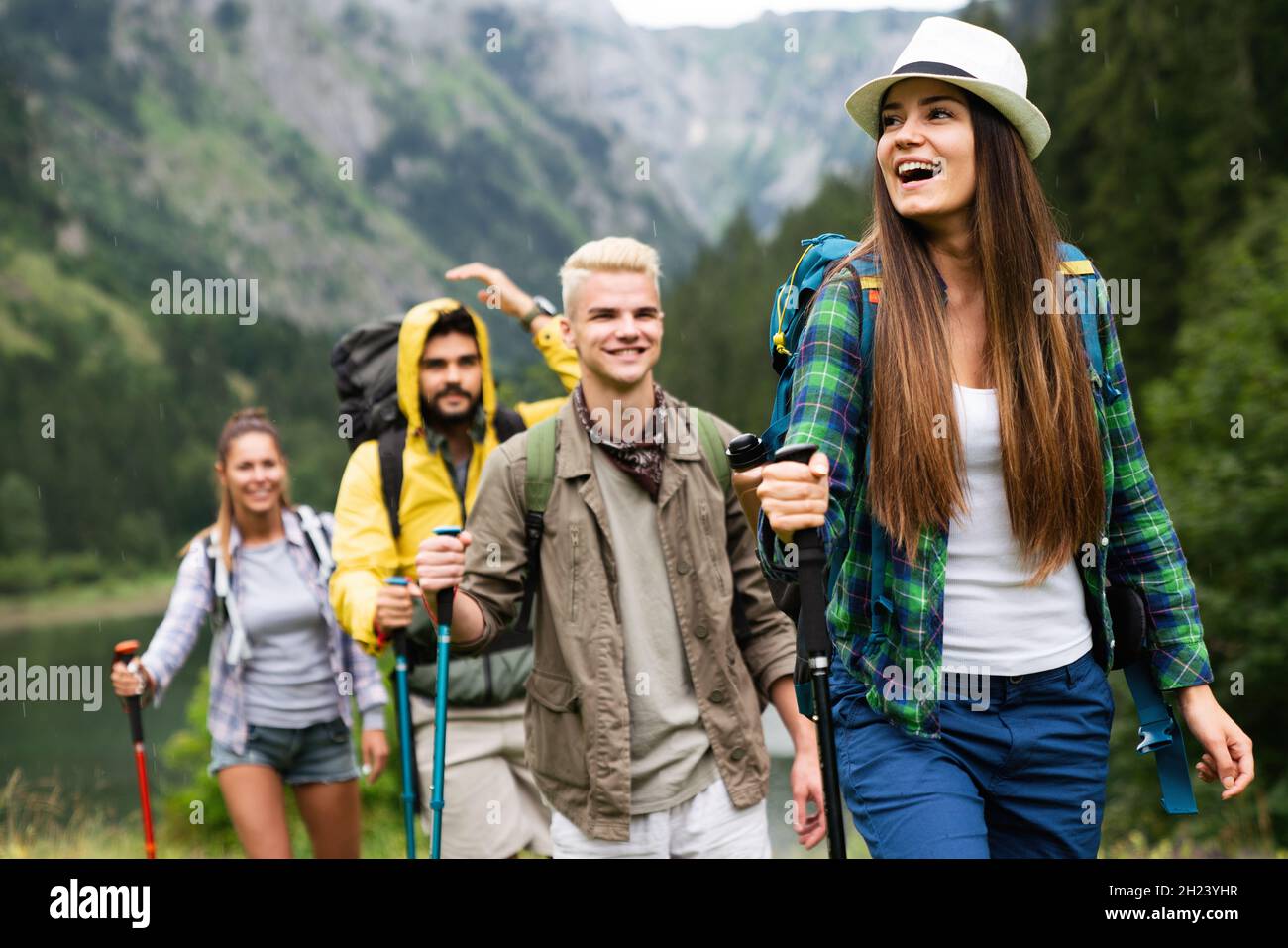 Group of happy hiker friends trekking as part of healthy lifestyle ...