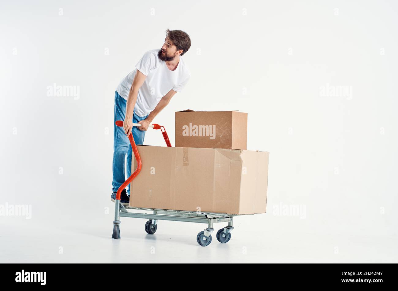 Cheerful man ride a cart entertainment isolated background Stock Photo ...