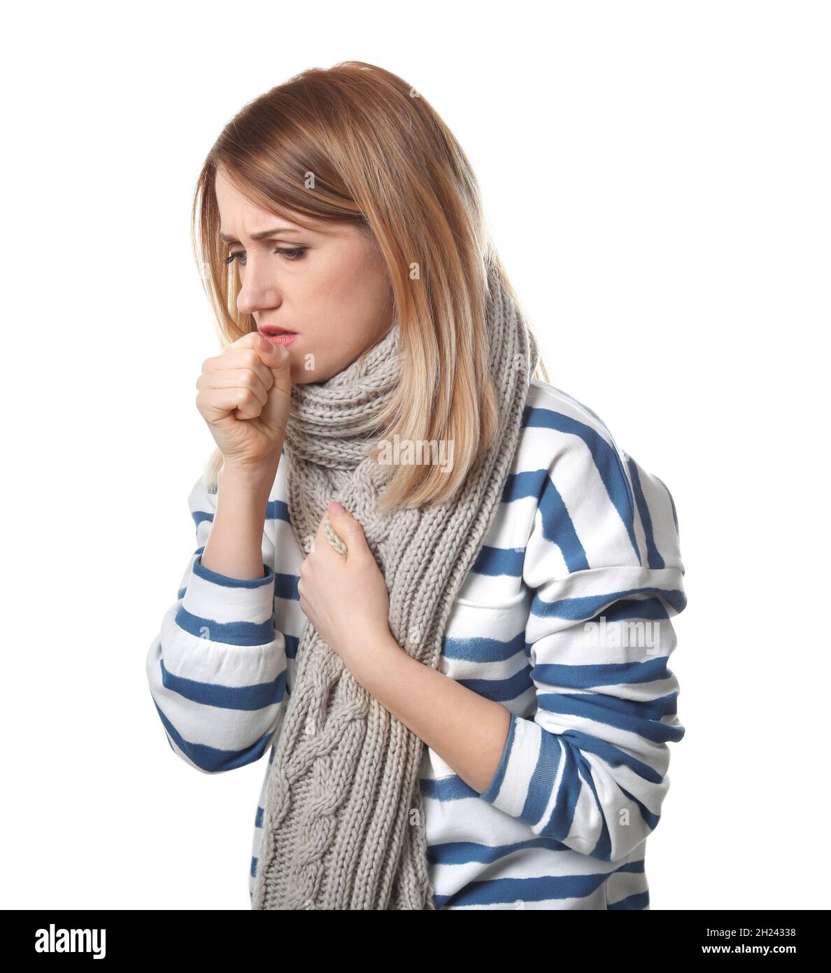 Young woman coughing on white background Stock Photo - Alamy