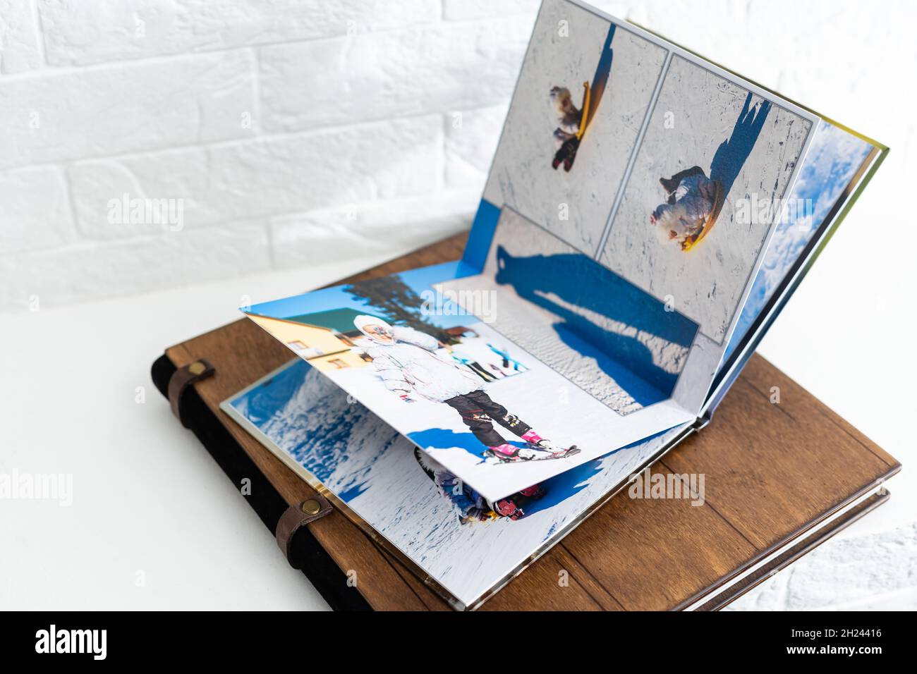 photo book with wooden cover. unfolded photobook. sample photobook ...