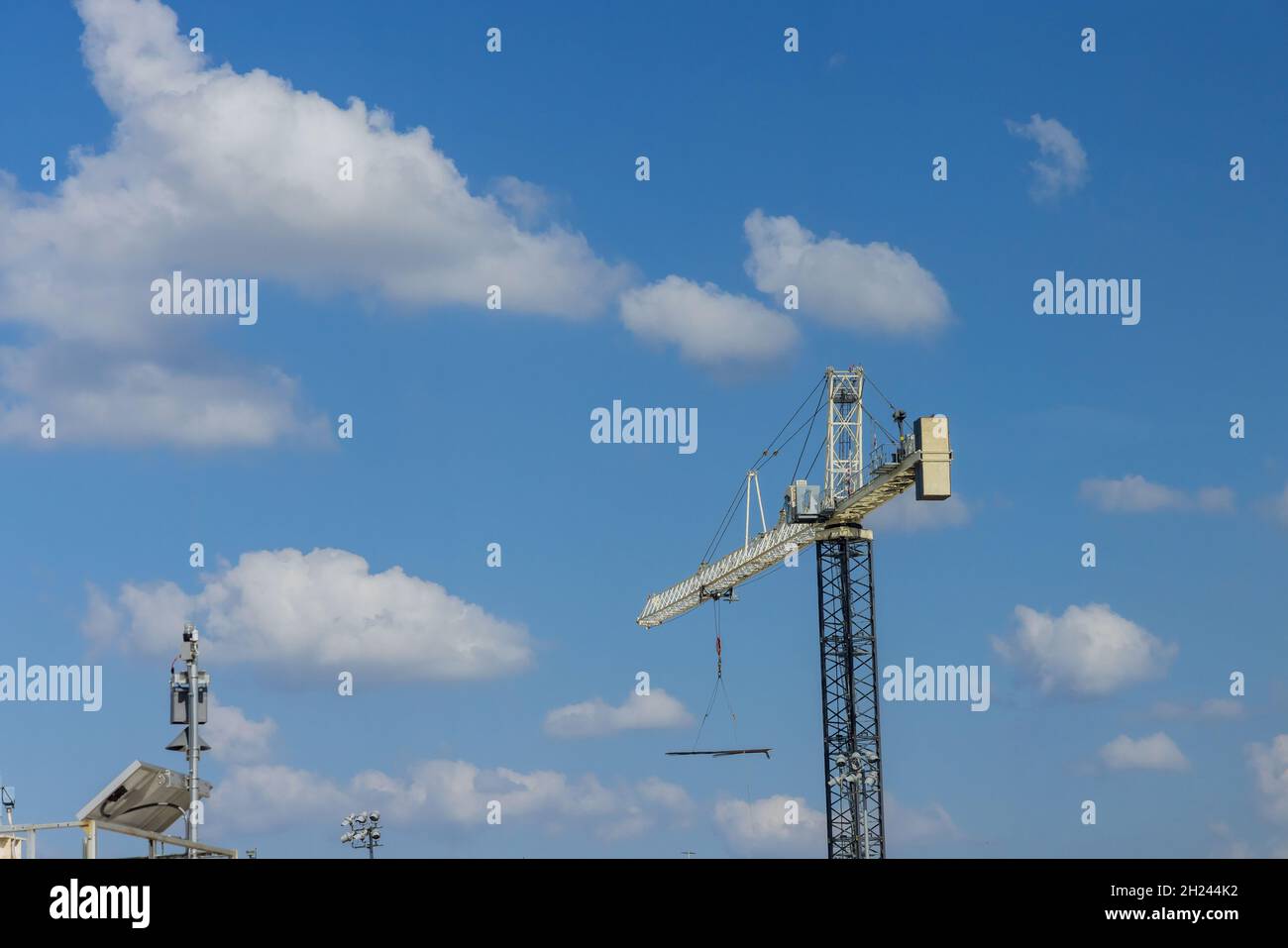 Rigger crane at construction structural steel large residential ...