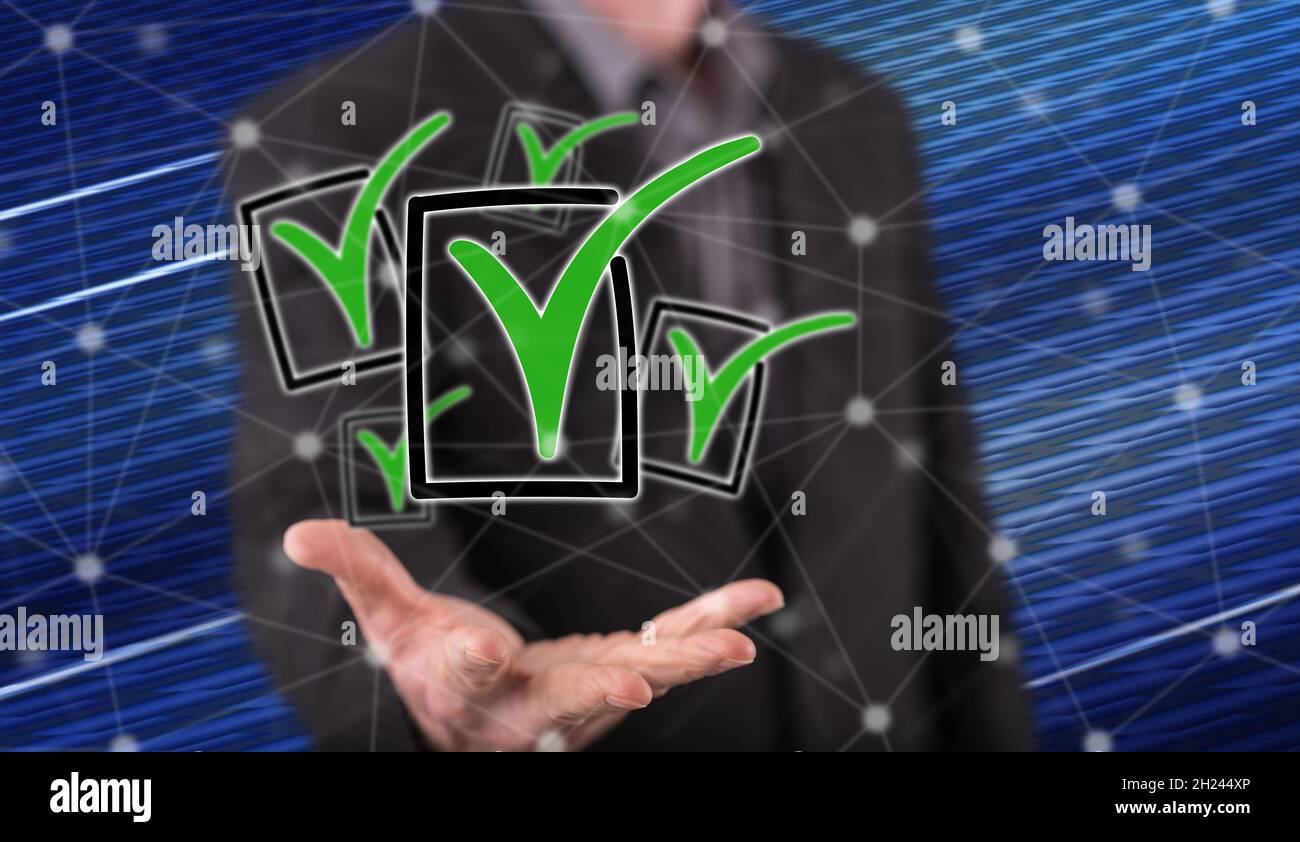 Validation concept above the hand of a man in background Stock Photo ...