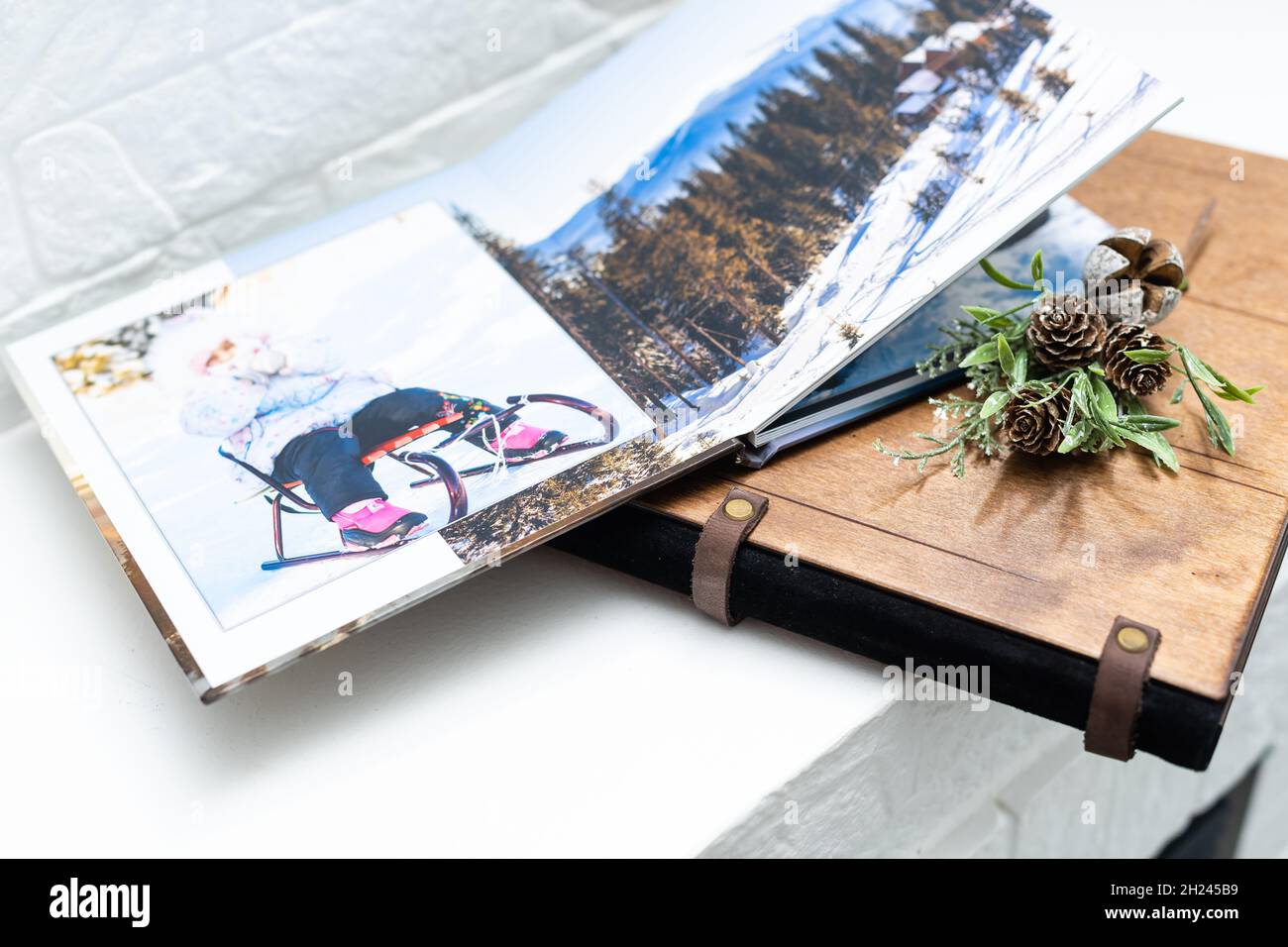 photo book with wooden cover. unfolded photobook. sample photobook ...