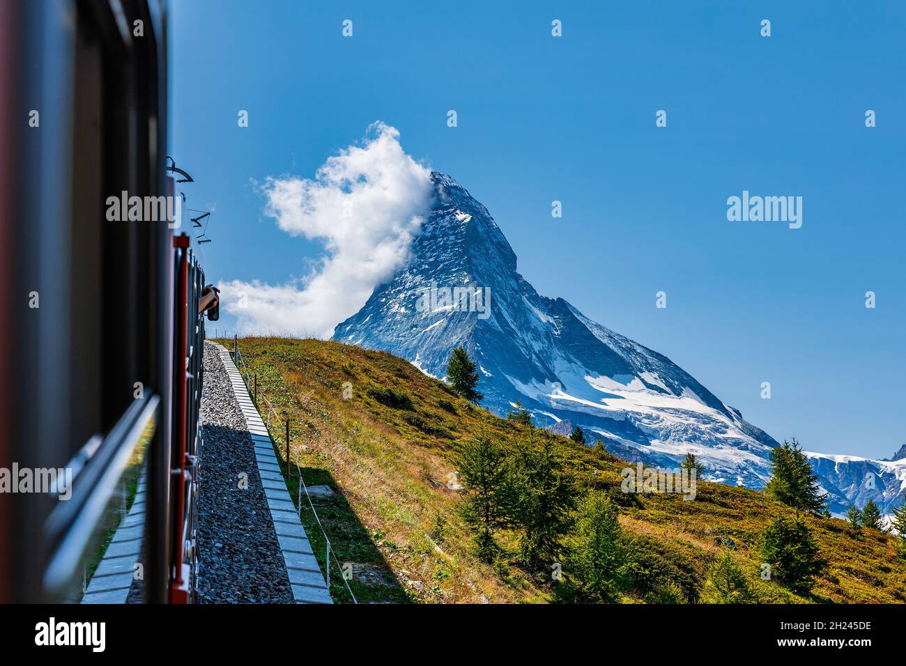 Gornergrat railway in summer with the matterhorn hi-res stock ...