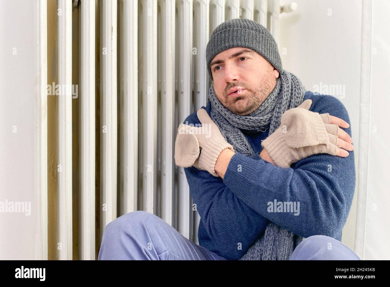 Freezing cold at home man hi-res stock photography and images - Alamy