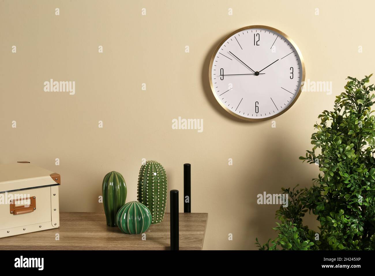 Room interior with clock and space for text on wall. Time management ...