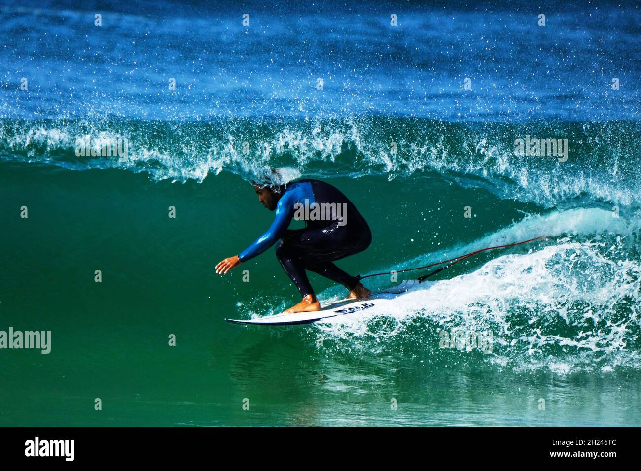 surfer tube riding Stock Photo - Alamy