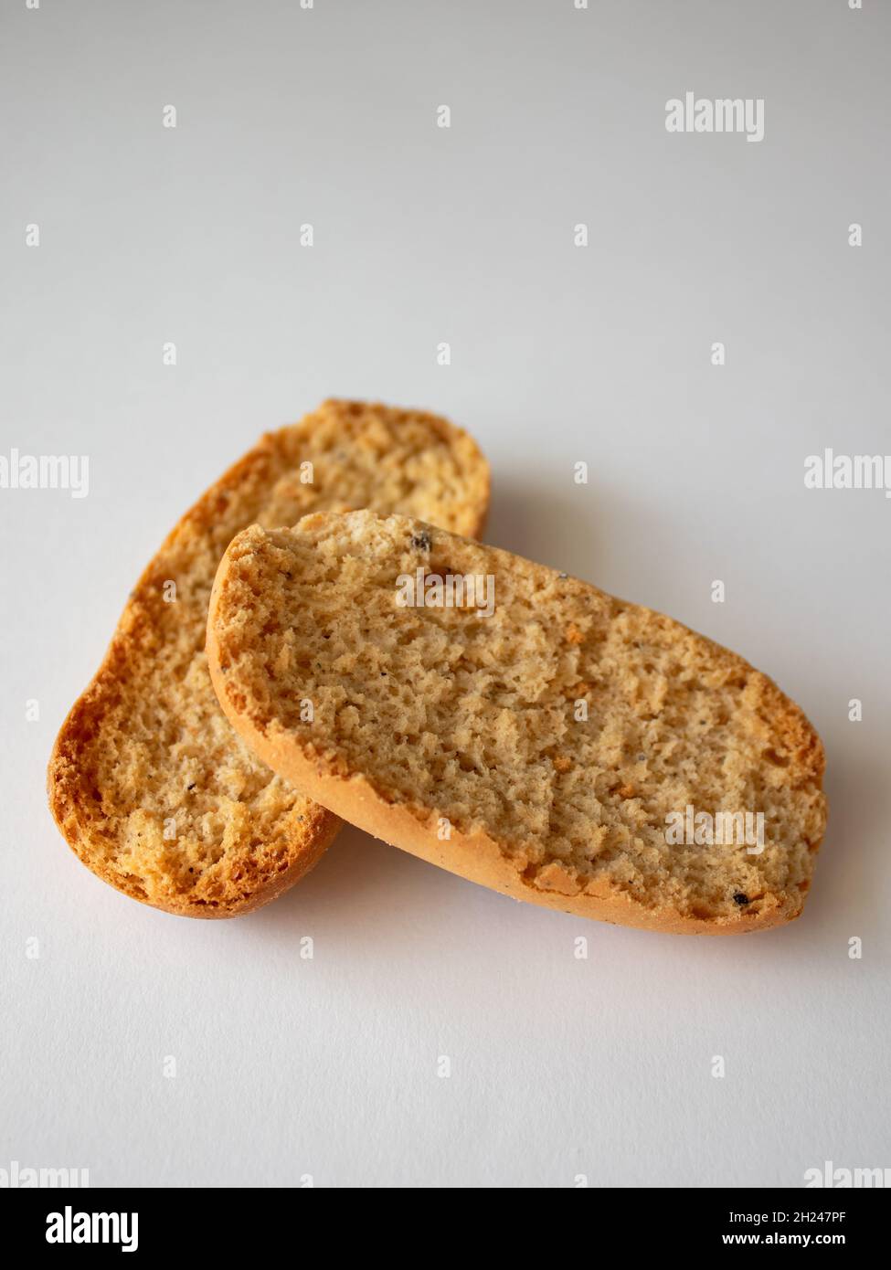 Crunchy cardamom rusks on white background Stock Photo - Alamy