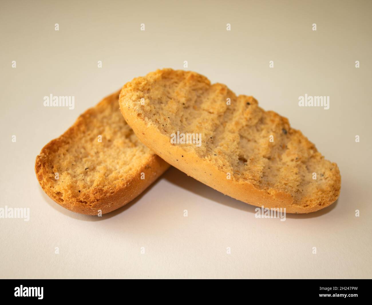Crunchy cardamom rusks on white background Stock Photo - Alamy