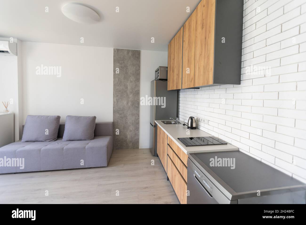 Modern small studio interior with details Stock Photo - Alamy