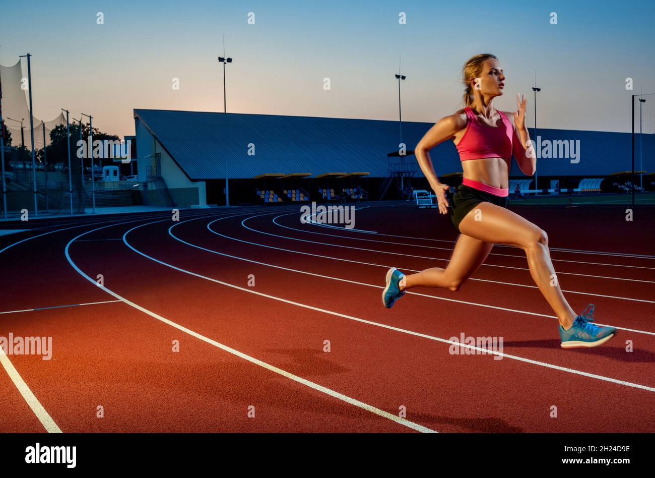 Runner sprinting towards success on run path running athletic track ...