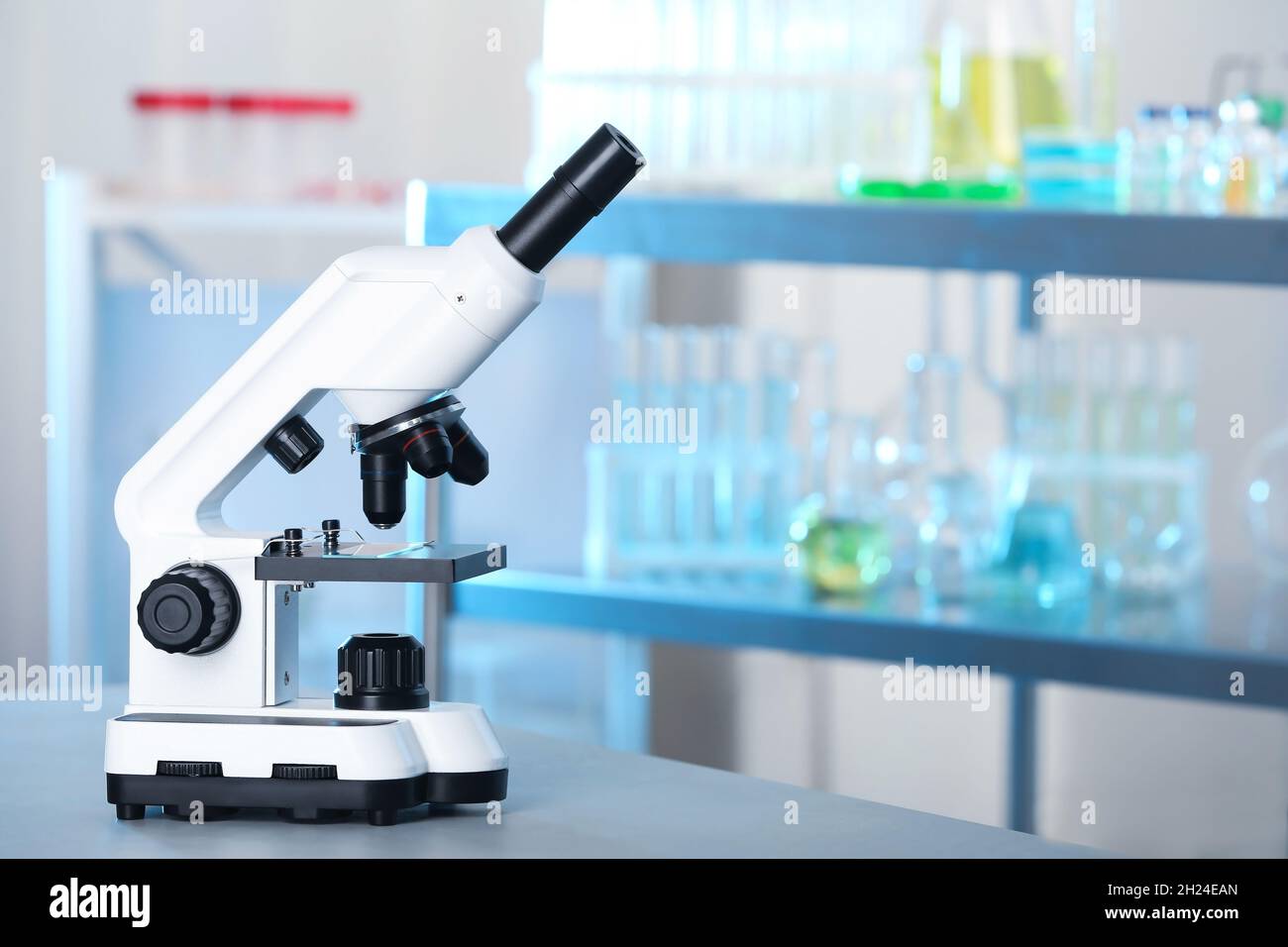 Modern microscope on table in laboratory. Chemical analysis Stock Photo ...