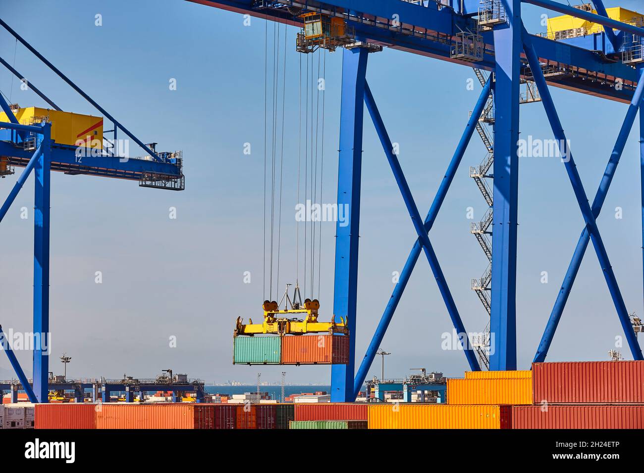 Cranes and containers. Global market. Cargo shipping. International ...