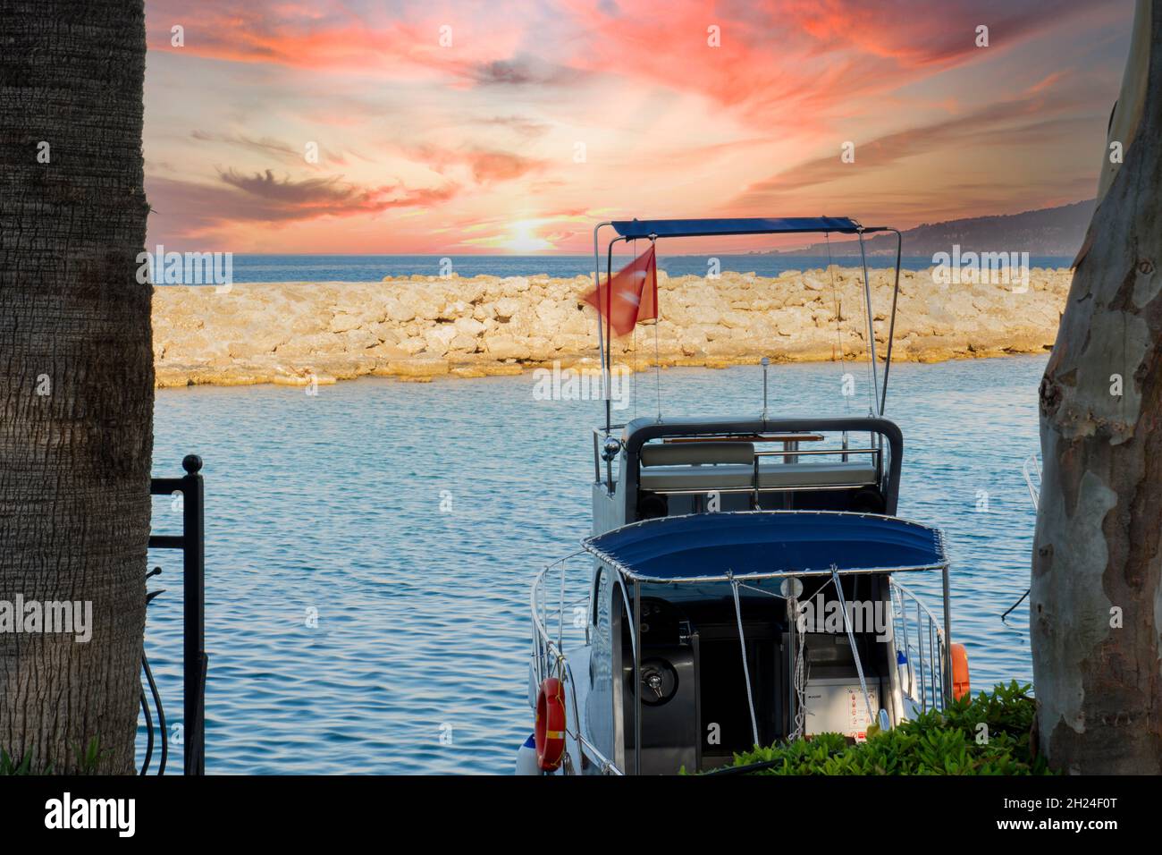 A mediterranean seaside town; Side. The entrance of the marina and the ...