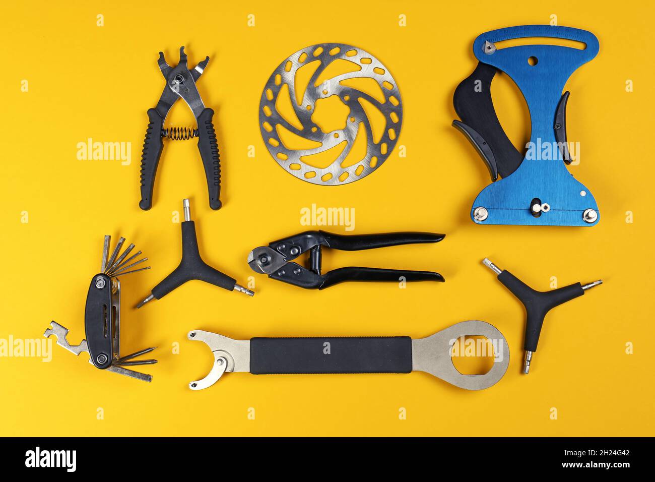 Set of different bicycle tools and part on color background, flat lay ...