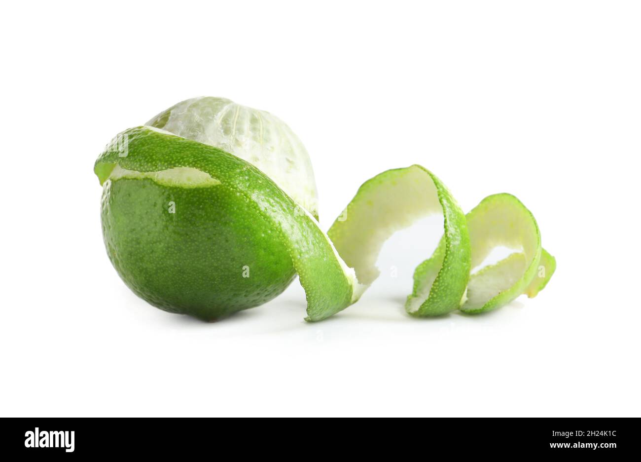 Fresh ripe lime with peel on white background Stock Photo - Alamy