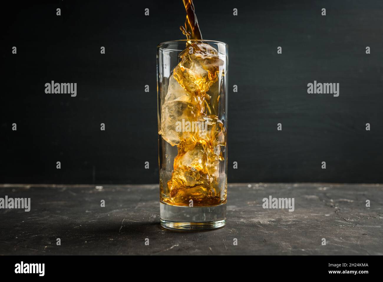 Pouring ice cold cola in hi-res stock photography and images - Alamy