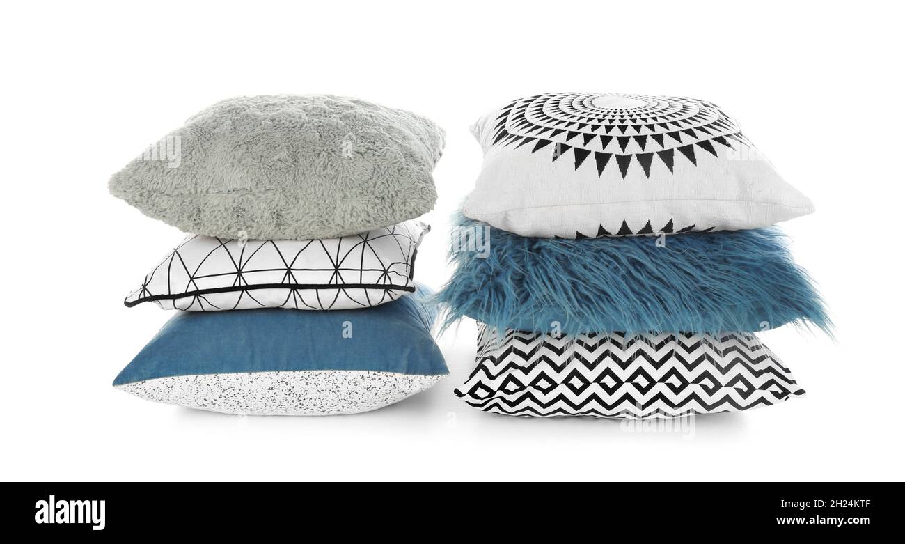 Stacks of different colorful pillows on white background Stock Photo ...