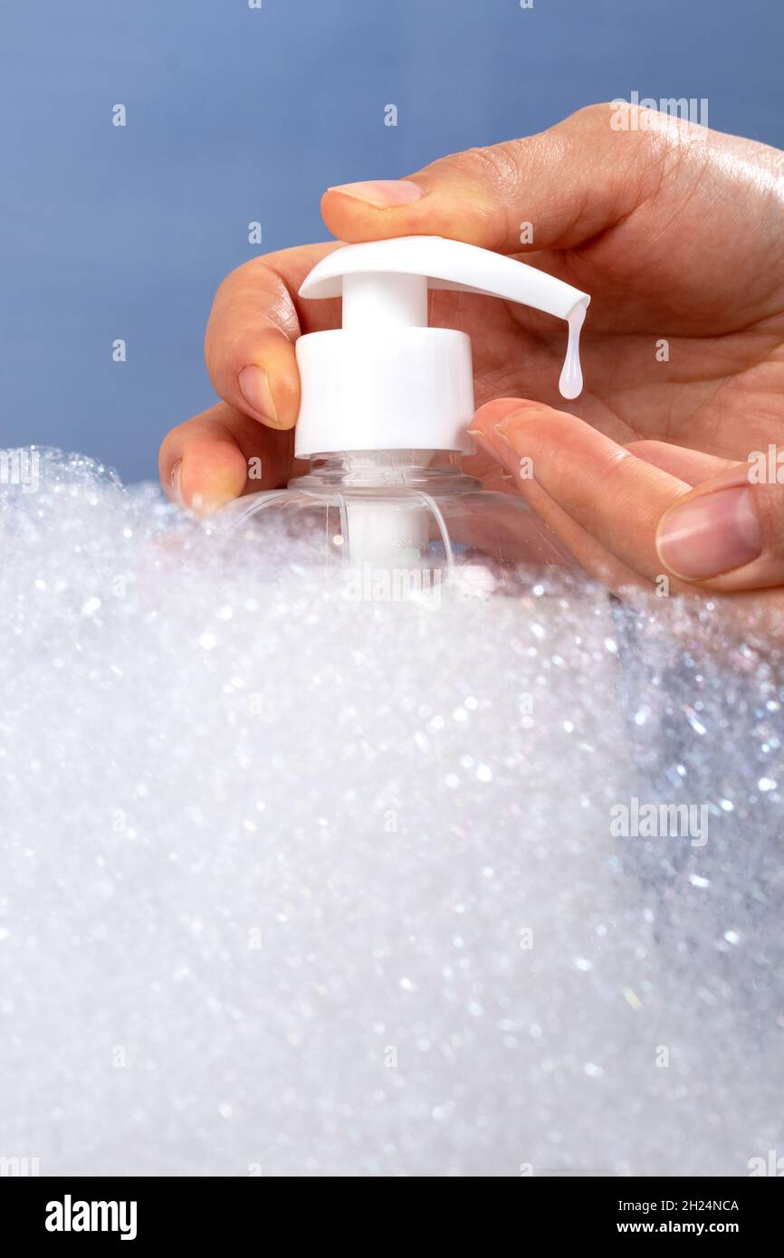 Close up photo of hand soap and bubbles. Hygiene and personal care ...