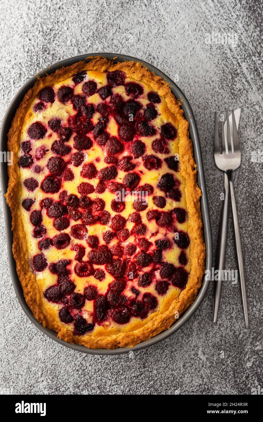 Raspberry pie with curd filling in an oval shape, top view Stock Photo ...