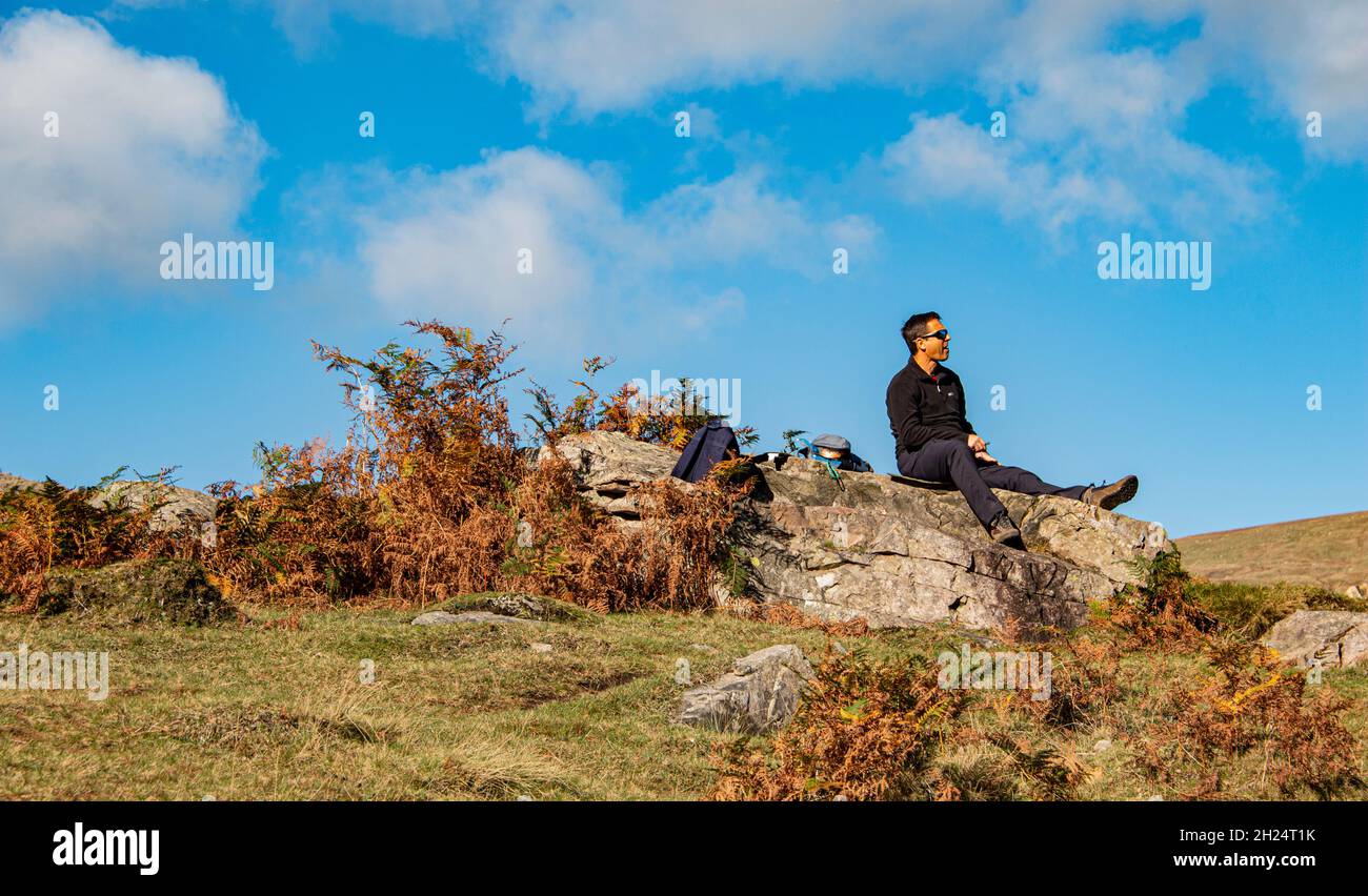 Handsome man looking into the distance on the shores of Wast Water ...
