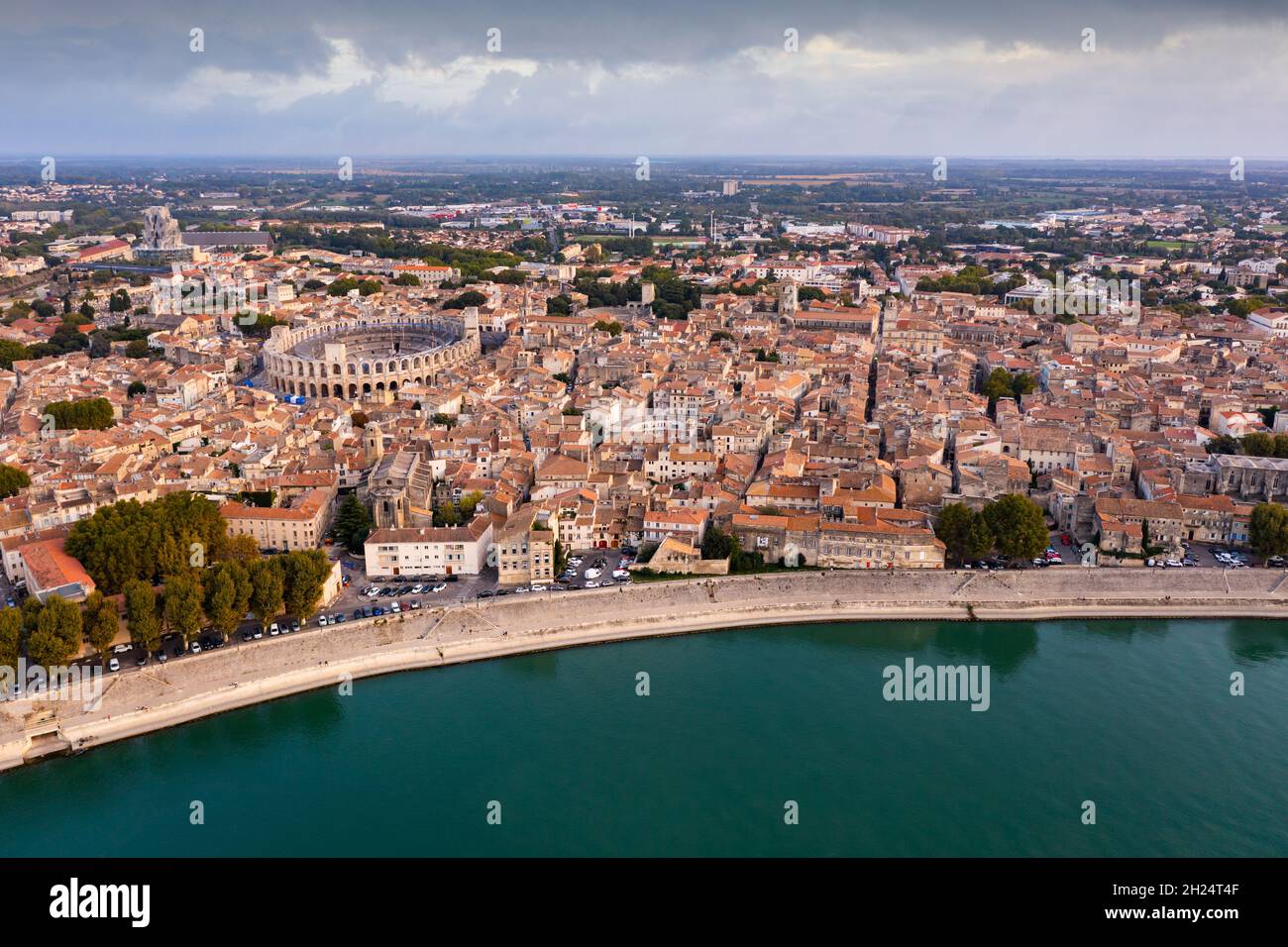 Aerial townscape of Arles with view of Arles Amphitheatre and Rhone ...