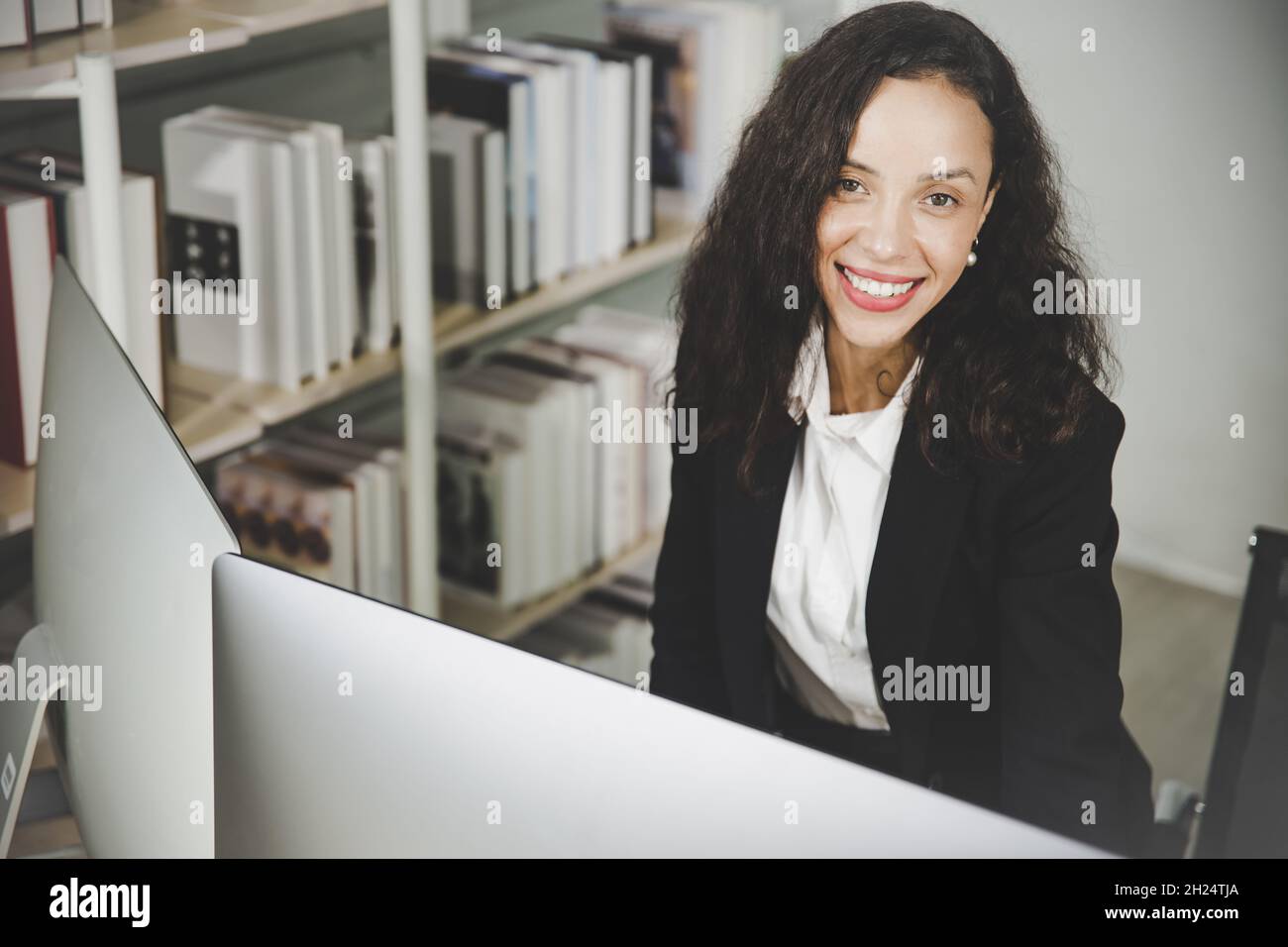 portrait beautiful confident business woman in formal suit smiled and ...