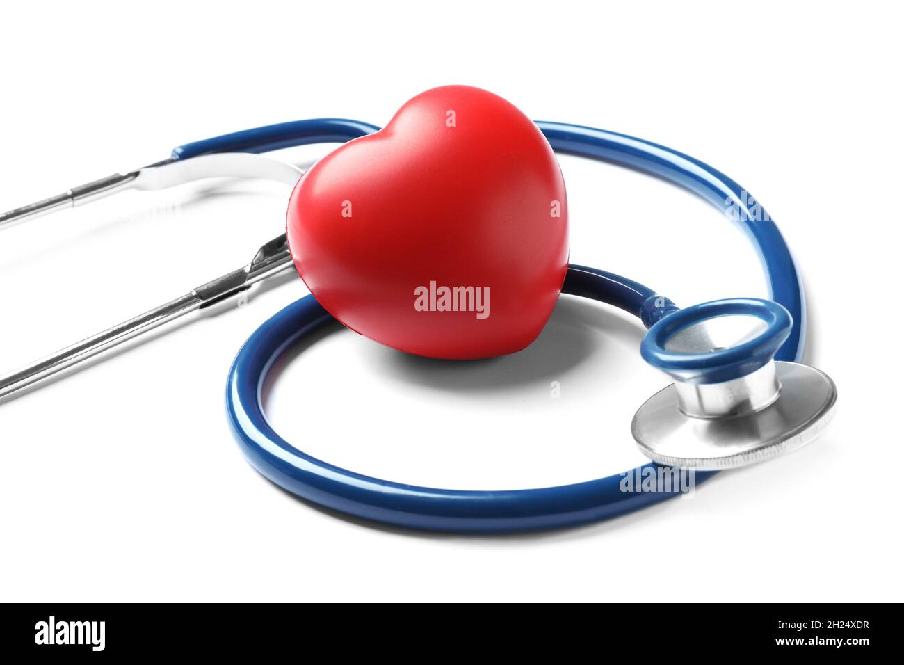 Stethoscope for checking pulse and red heart on white background Stock ...
