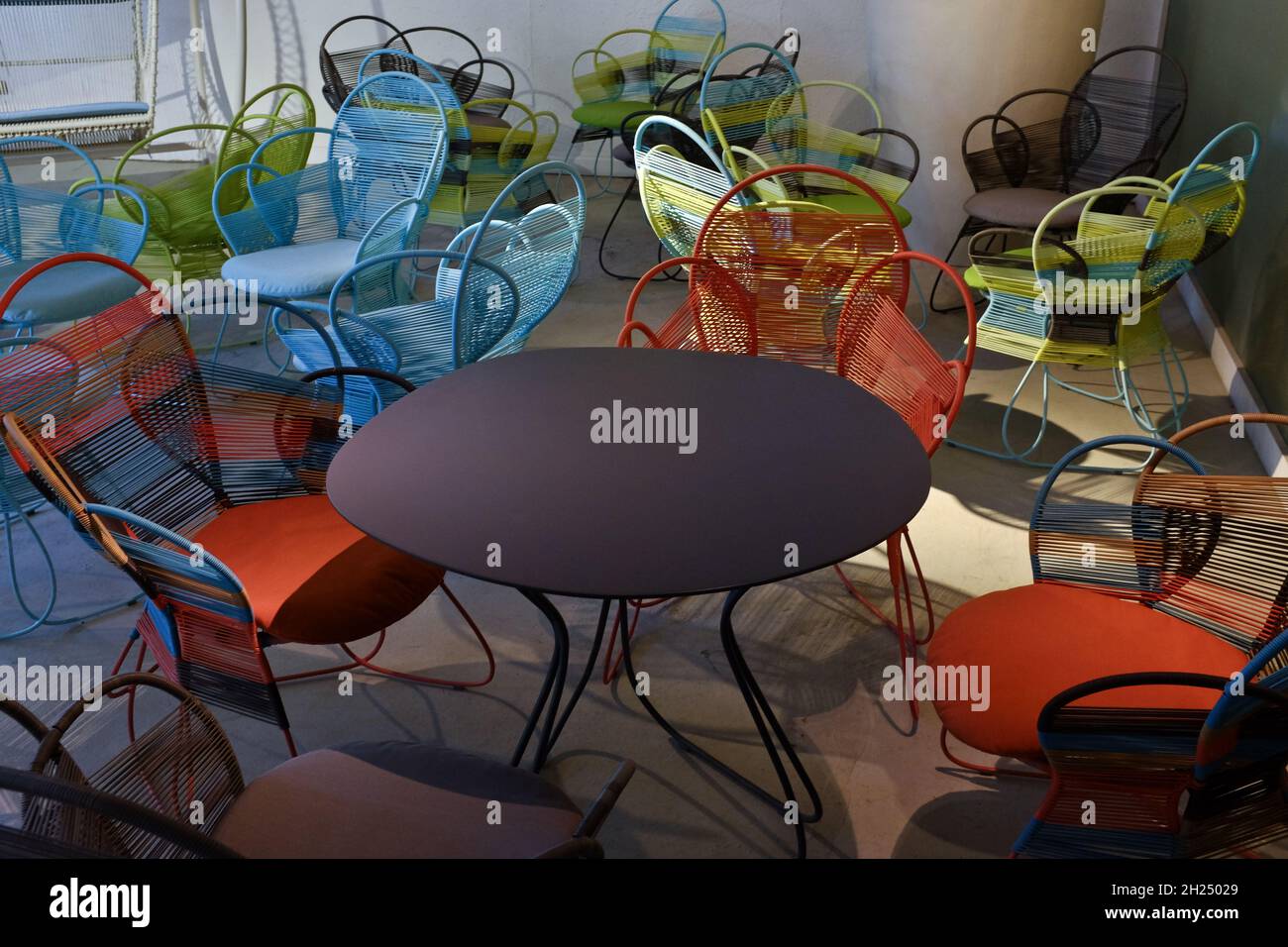 A new line of chairs, in the showroom of the firm Kenneth Cobonpue, in ...