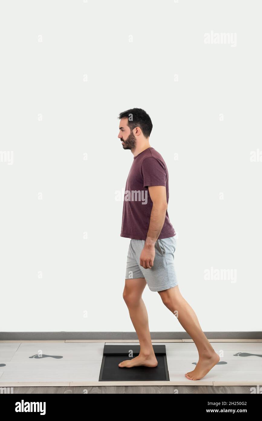Patient performing an exercise to evaluate his stepping Stock Photo - Alamy