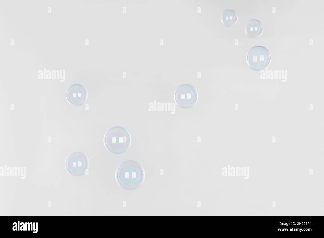 Beautiful translucent soap bubbles on light background Stock Photo - Alamy Beautiful translucent soap bubbles on light background Stock Photo - Alamy