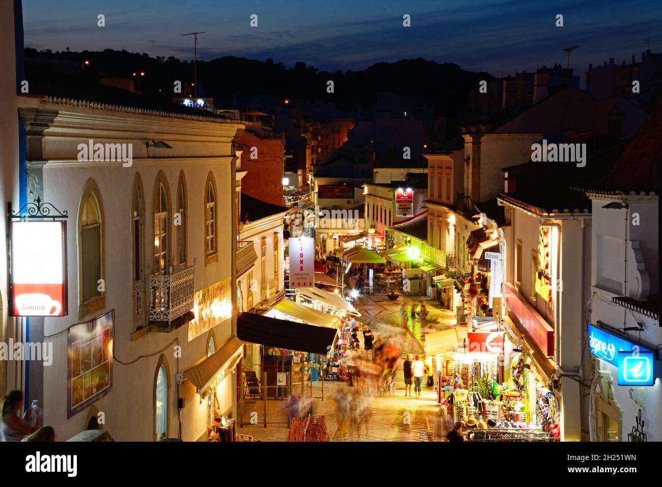 Elevated view of the R 5 de Outubro shopping street in the evening with ...