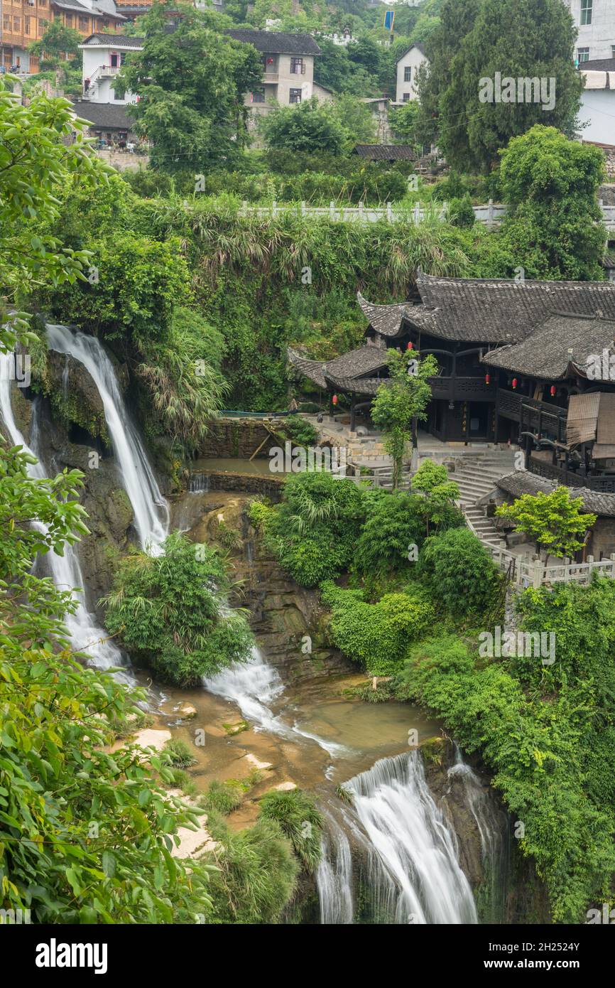 The Wangcun Waterfall separates the ancient town of Furong in Hunan ...