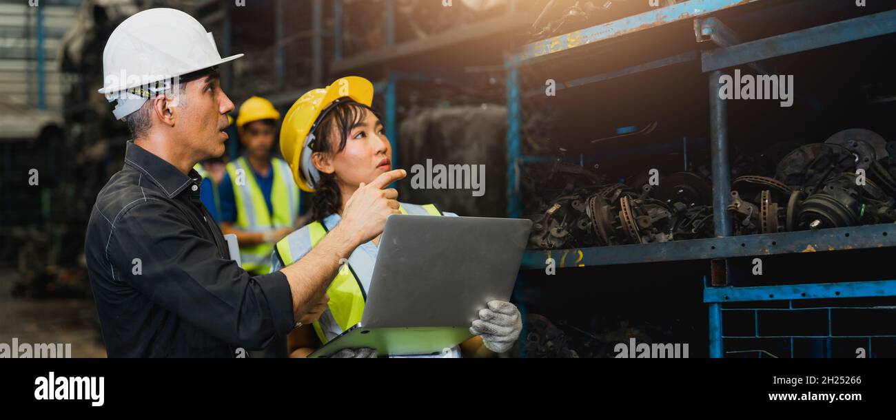 engineer team working and check tools of machine by looking laptop ...