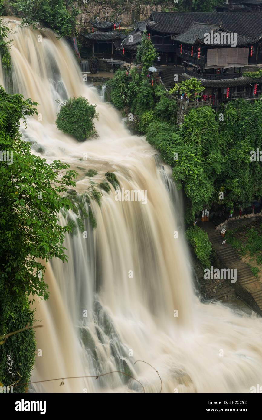 The Wangcun Waterfall separates the ancient town of Furong in Hunan ...