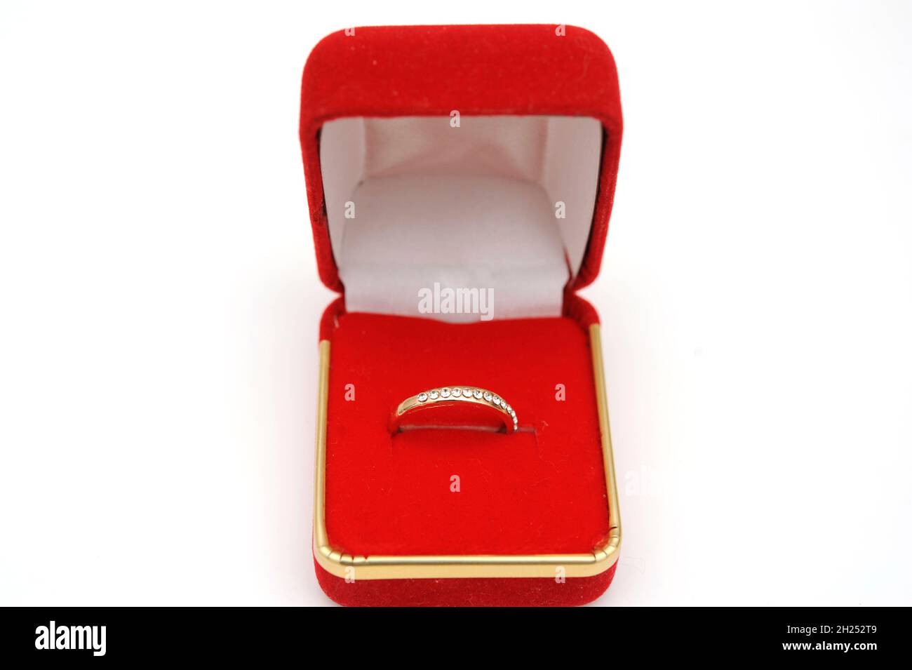 red velvet box and engagement ring Stock Photo - Alamy