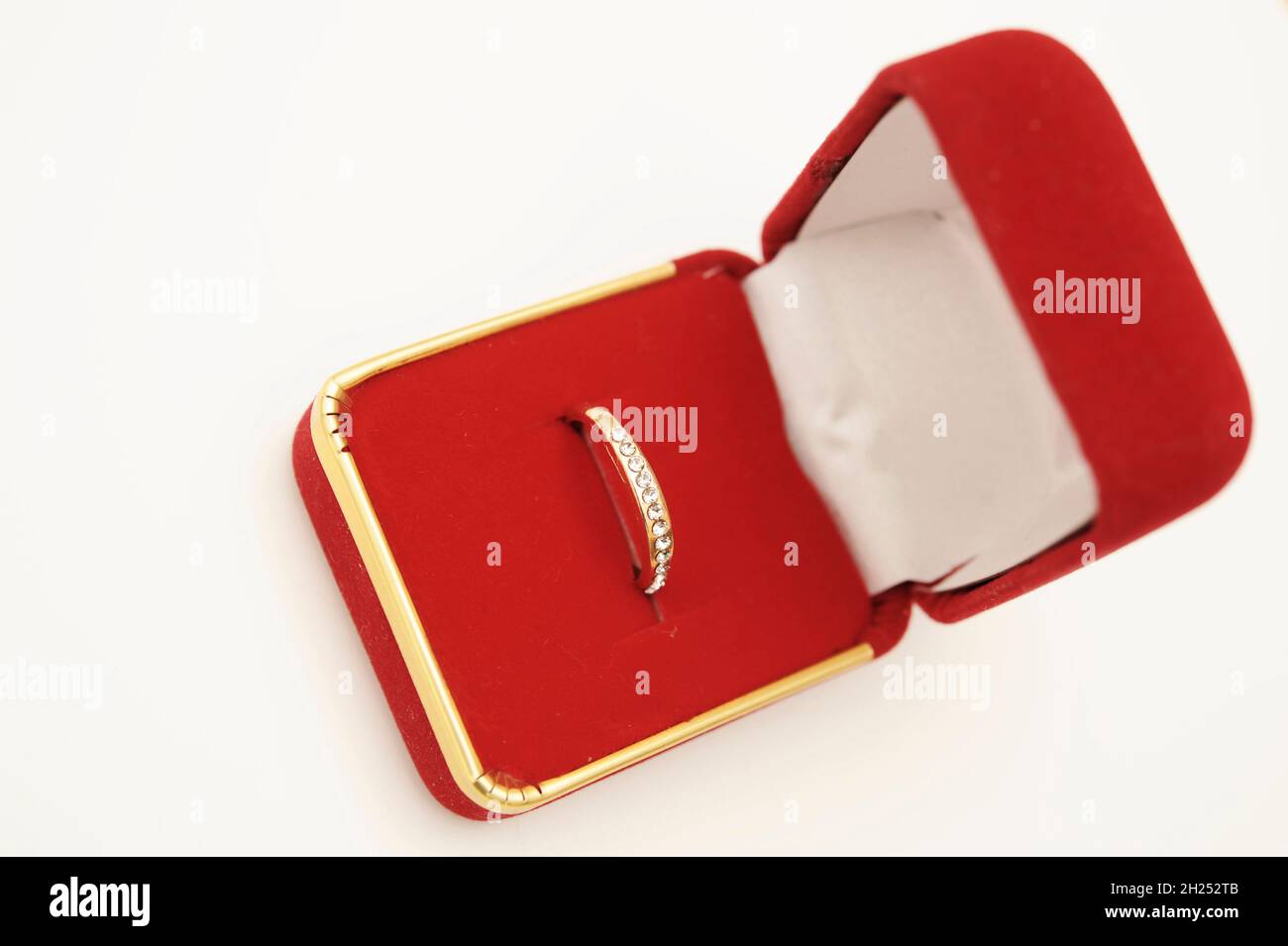 red velvet box and engagement ring Stock Photo - Alamy