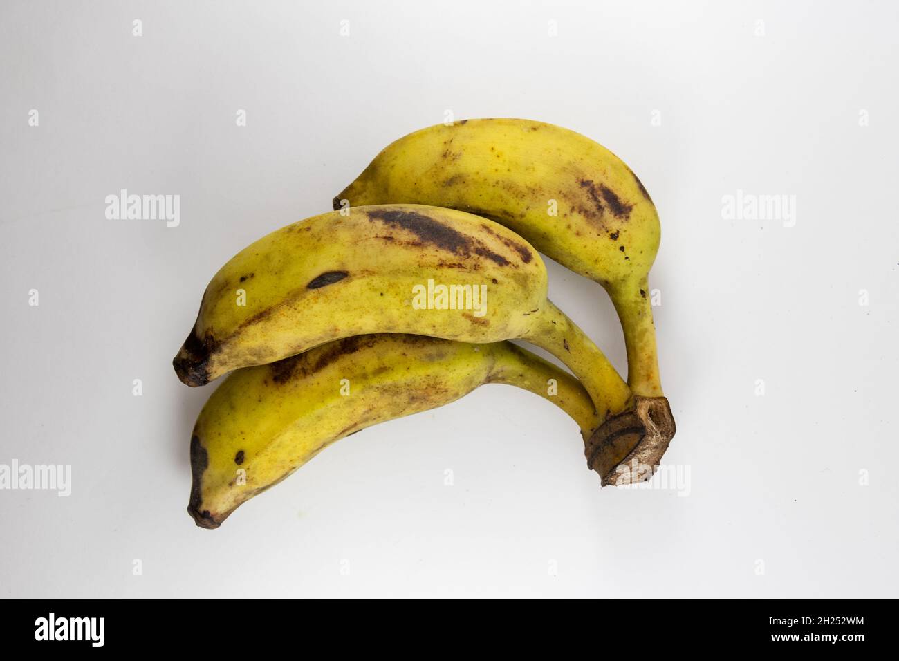 Yellow ripe sugar banana isolated on white background Stock Photo - Alamy